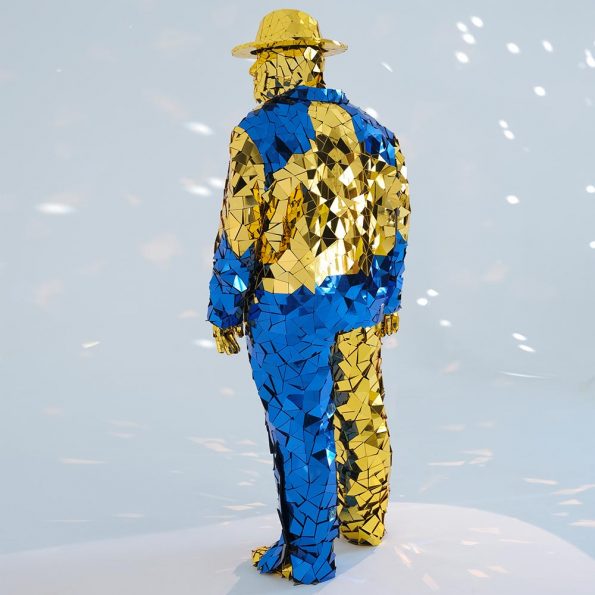 Yellow and blue Mirror Man costume with broken mirror tiles