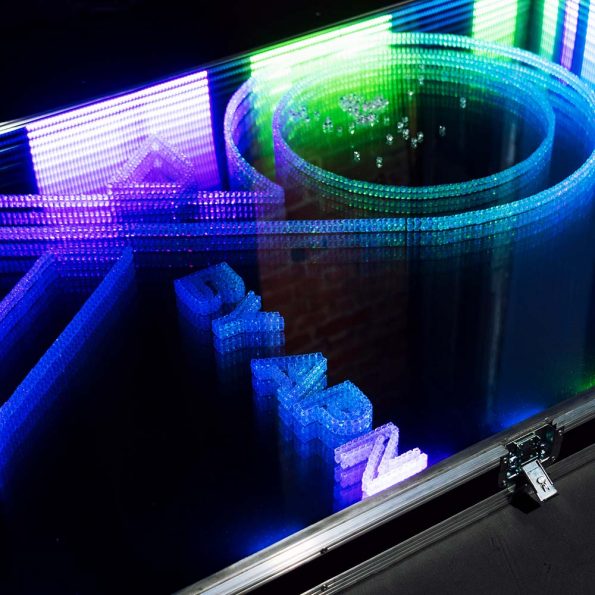 Mobile light up Infinity Mirror decoration on the wall